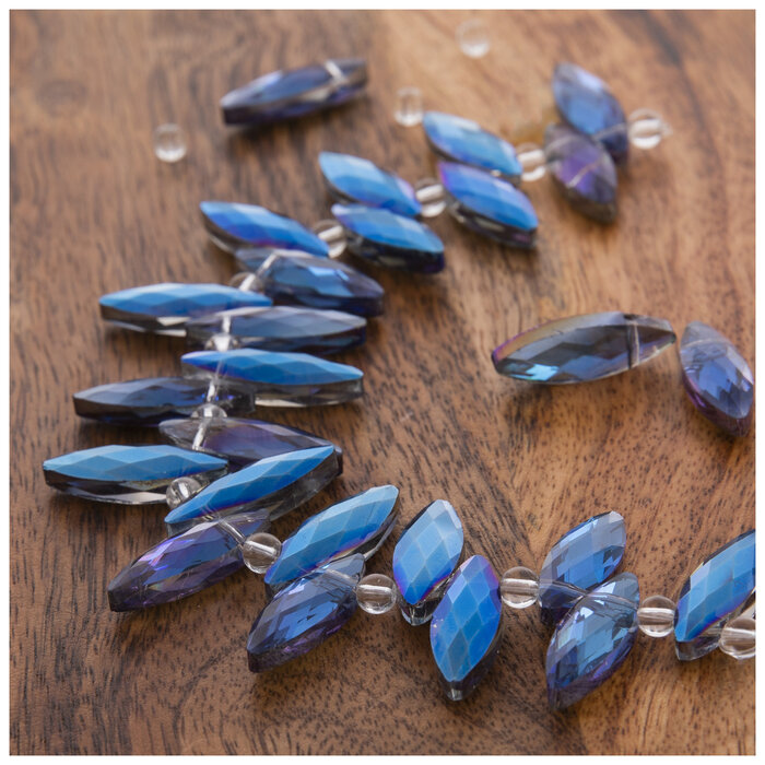 Montana Blue Briolette Glass Oval Bead Strand | Hobby Lobby | 417501